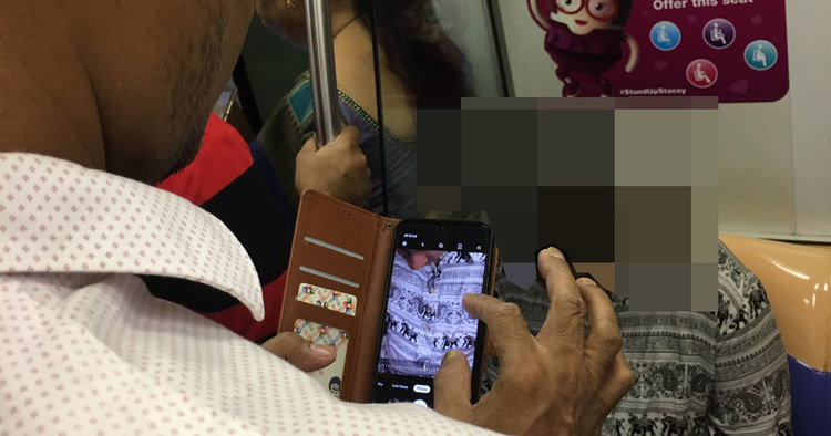 Man allegedly caught red-handed taking sneaky photo of woman on North East Line MRT train | Nestia