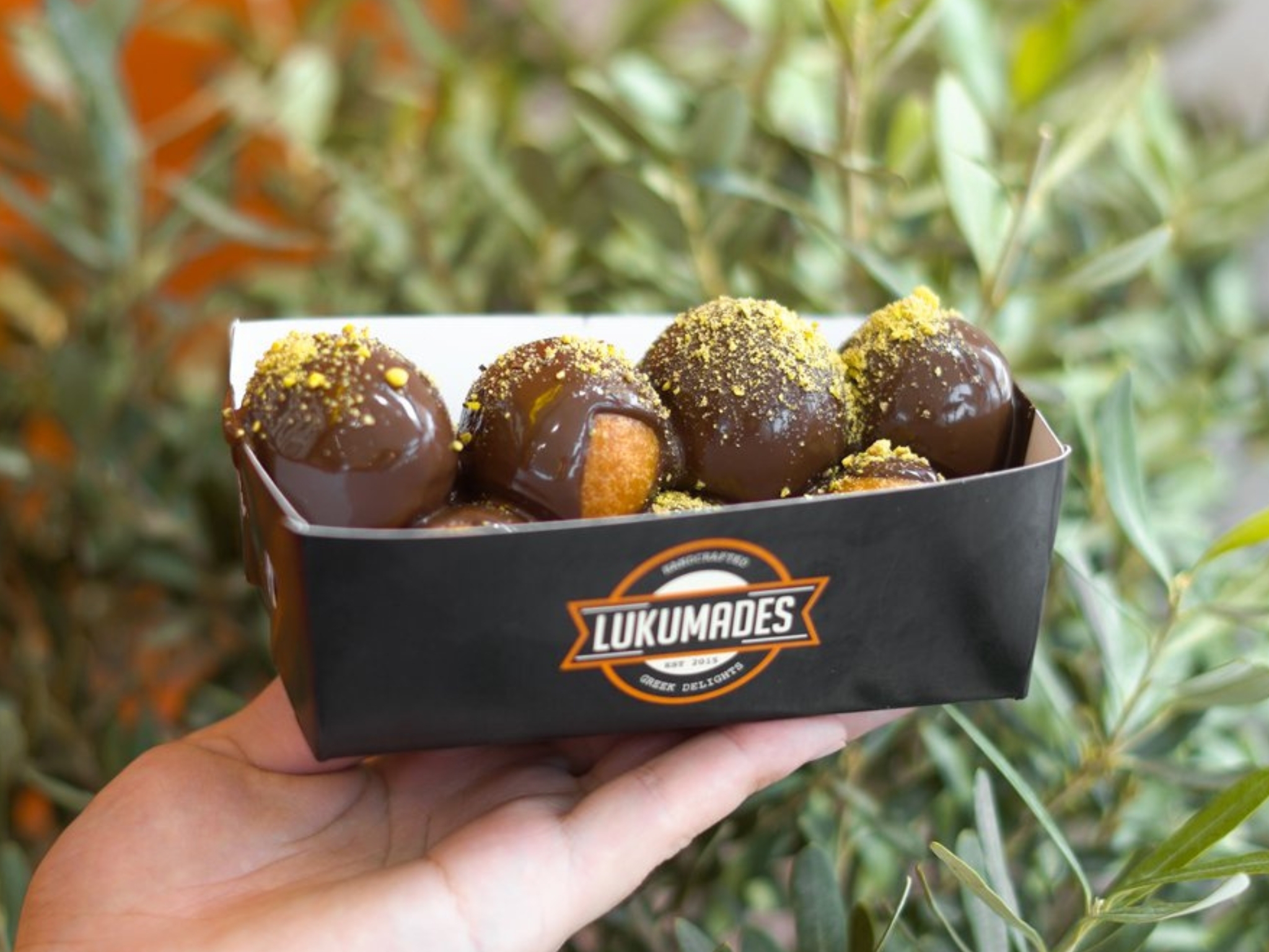 Popular Australian chain with bite-sized Greek doughnuts opens at Arab ...