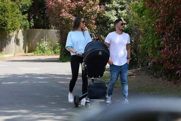 Peter Andre and wife Emily look besotted with new baby as they're seen out for the first time ...