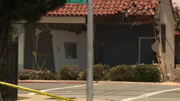 Three dead after 100mph Tesla crash into building ejects passengers and ...