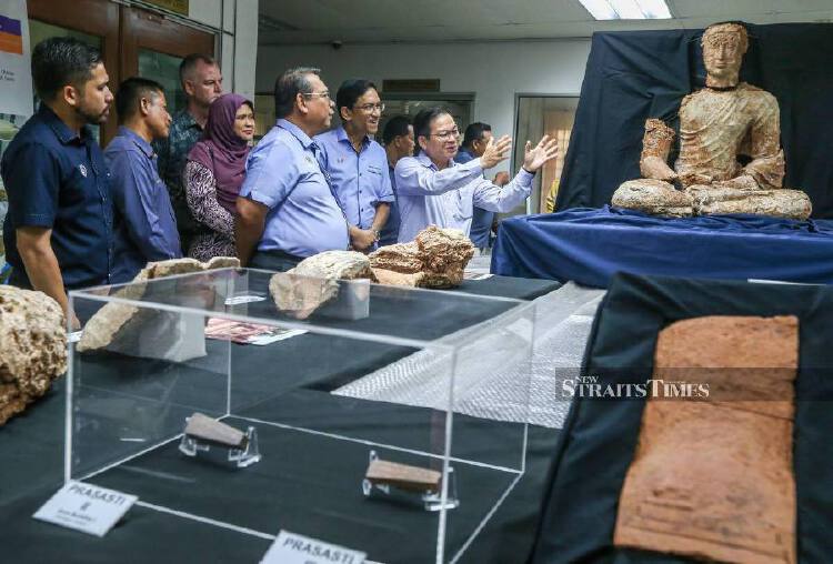 USM researchers unearth life-size Buddha figure at Bukit Choras temple ...