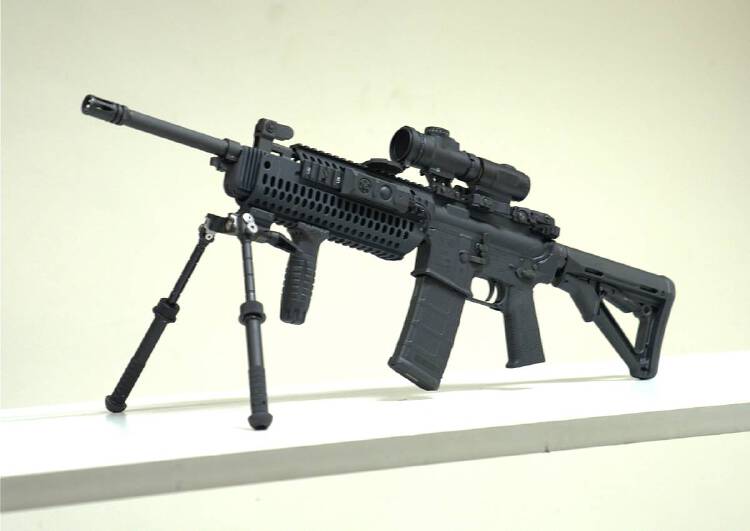 I try my hand at firing the Singapore Army’s new light machine gun ...