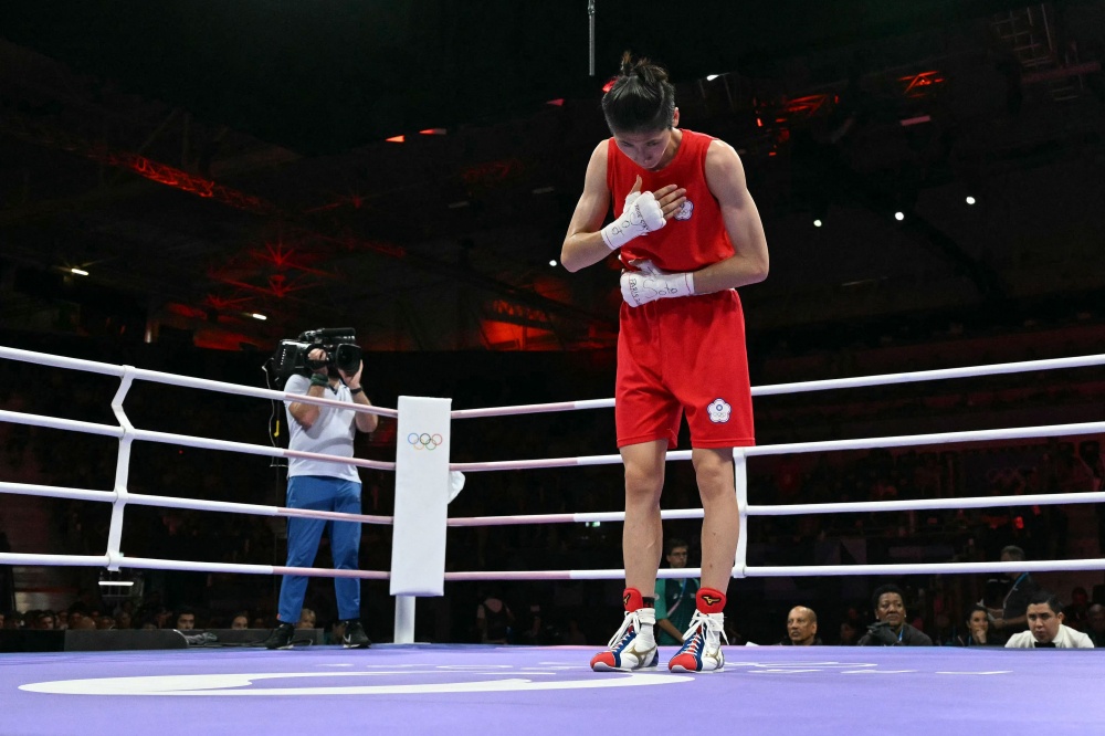 Taiwanese boxer in Olympics gender row wins to guarantee medal | Nestia