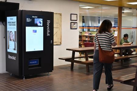 Free debit cards now a tap away with Revolut vending machine at NUS ...