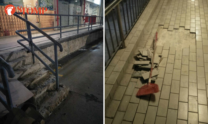 Uneven staircase with broken railing next to uncovered drain might be ...