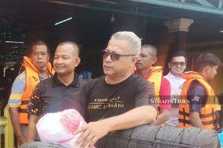 IAM and Etiqa Takaful provide uniforms for 200 underprivileged pupils | Nestia