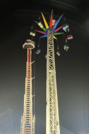Fun fair terror as thrillseekers stuck 65ft in the air for four HOURS ...