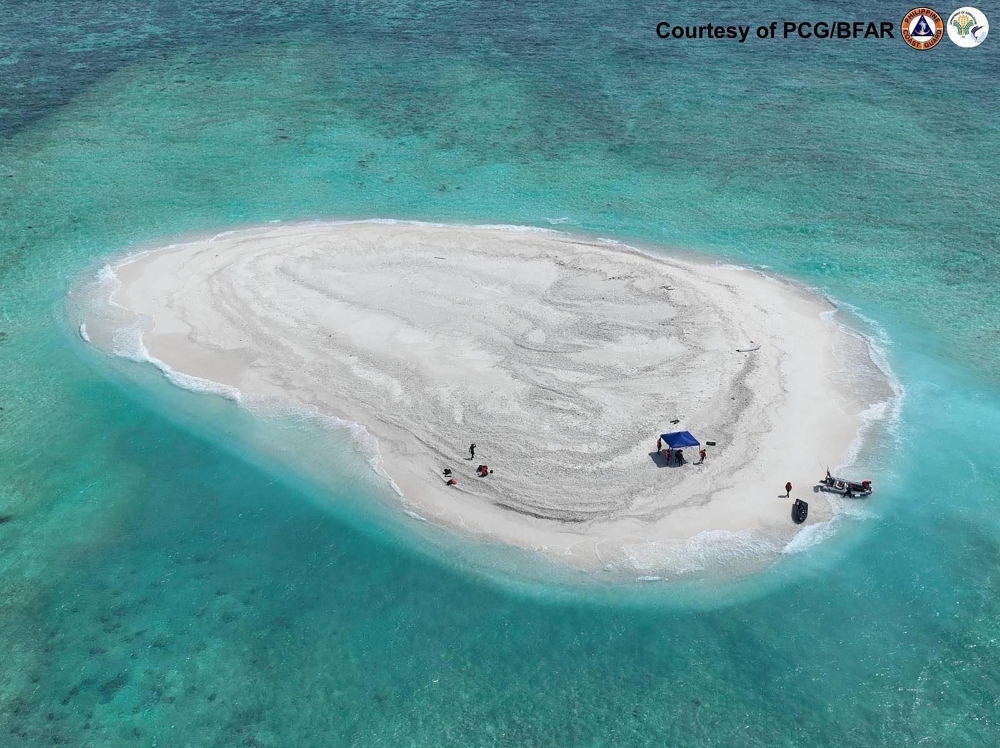 Chinese coast guard seizes disputed Sandy Cay reef near key Philippine military outpost ...